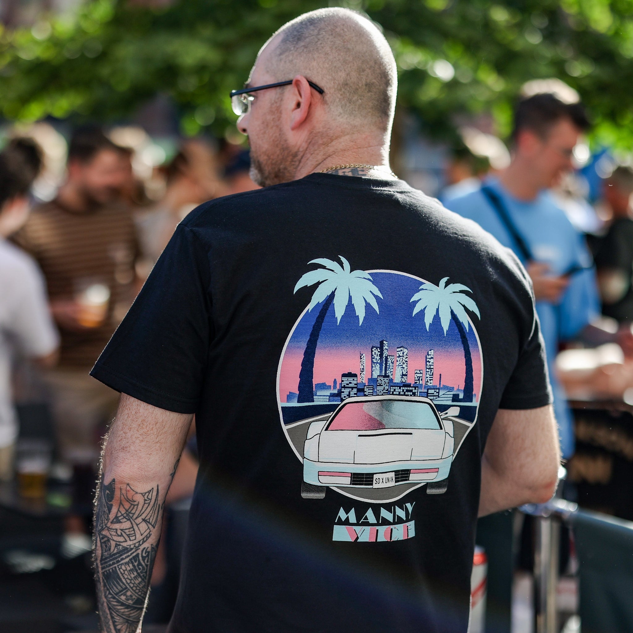 Shindigger X UN:IK 'Manny Vice' Tee - Black – UN:IK Clothing